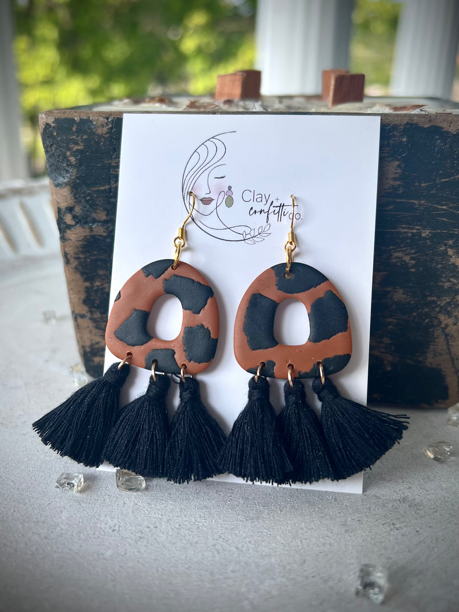 Rust cow print with black tassels – Clay+ConfettiCo